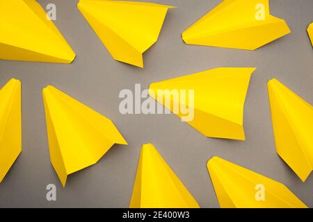 Paper planes on grey background Stock Photo - Alamy