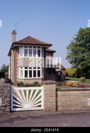 A two storey interwar style home in Dover Heights, Sydney painted white ...