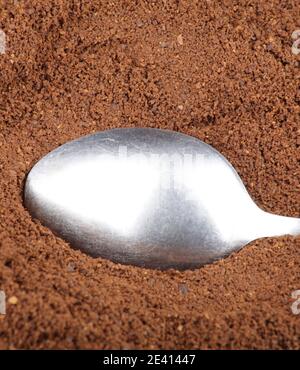 milled coffee and one teaspoon Stock Photo - Alamy