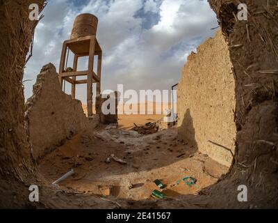 Water tanks in the ruins of a building in the Sahara desert of Morocco ...