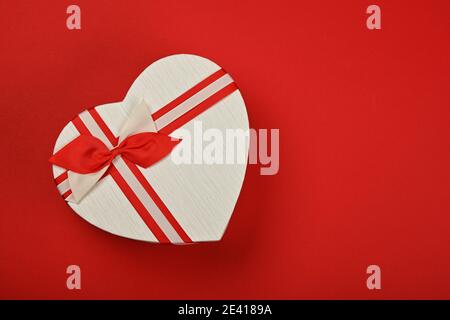Valentine template of one white closed heart shaped gift box with ...
