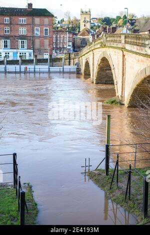 Flood defences are put in place along the wharfage next to the River ...