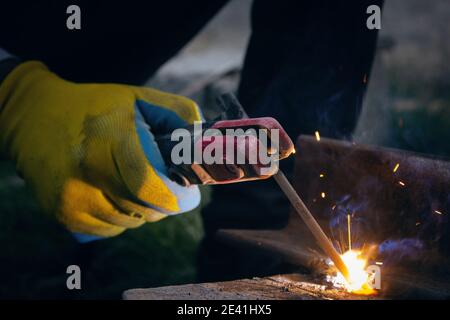 young foreman doing electrical welding Stock Photo - Alamy