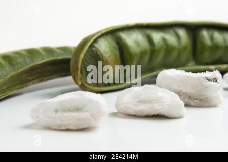 Isolated closeup of guaba pods and seeds on white background Stock ...