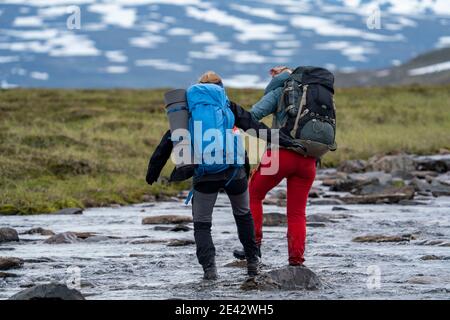 team work during long Hike in Padjelanta National Park, Europe Stock ...