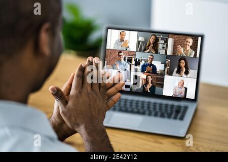 Clapping In Virtual Video Conference Call On Computer Stock Photo - Alamy