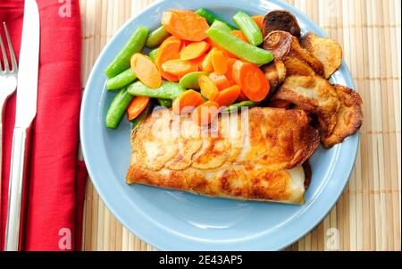 halibut fish fillets wrapped in potato Stock Photo - Alamy