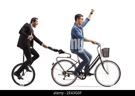 Male cyclist riding a bicycle pulling a loaded bike trailer on Avon ...