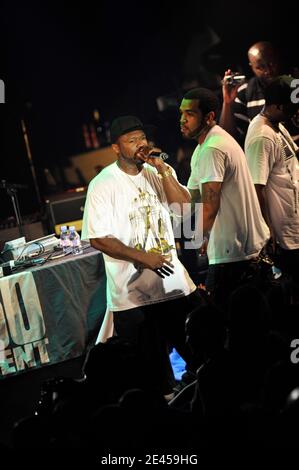 50 cent and Kanye West performs Live during the Christian Audigier ...