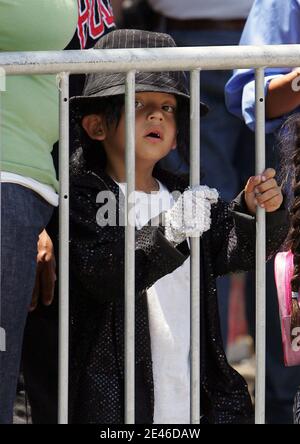 Fans and Media wait outside the entrance to the Jackson family compound ...