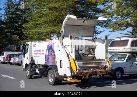 Garbage rubbish collection truck at Palm Beach Sydney collecting waste ...