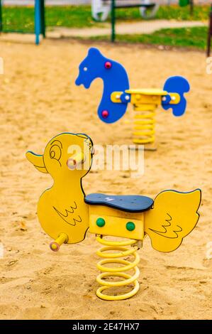 rockers in a playground for children Stock Photo - Alamy