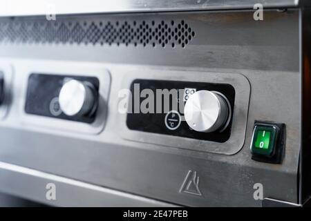 Commercial kitchen appliance temperature controls close up Stock Photo ...