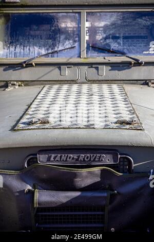 Front view of a Land Rover Discovery approaching a steep off-road ...