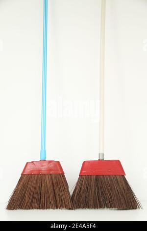 Piassava, piaçava broom with long wooden handle isolated on white ...