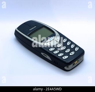 The Nokia 3310, a classic mobile phone released in the early 2000s ...