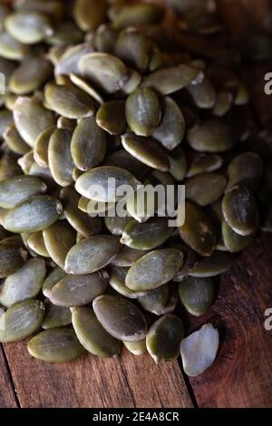 Fresh green pumpkin peeled seeds in the bowl Stock Photo - Alamy