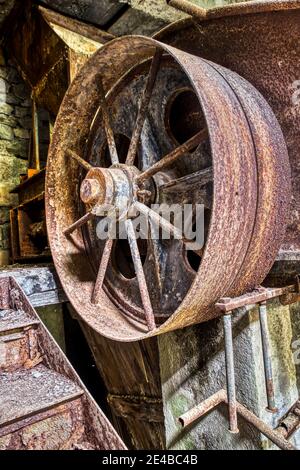 old rusty metal wheel with spokes for work in agriculture Stock Photo ...