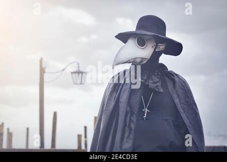 Plague doctor traditional Venice carnival costume with beaked mask on ...