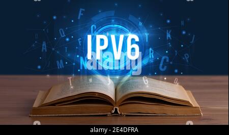 IPV6 inscription coming out from an open book, digital technology ...