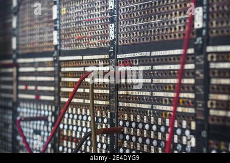 Old fashioned manual telephone exchange switchboard displayed at ...