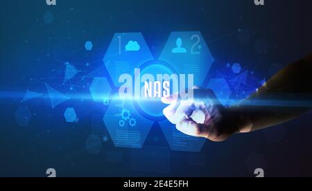 Hand touching NAS inscription, new technology concept Stock Photo - Alamy