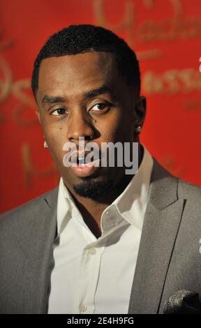 Sean Diddy Combs with his wax figure and his family at the unveiling of ...