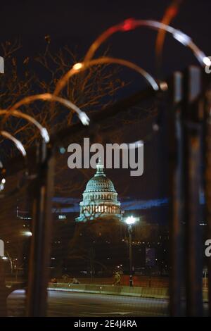Razor wire and fences still surround the United States Capitol building ...