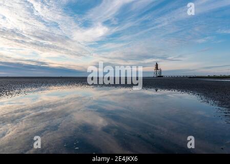 Obereversand lighthouse with mirror image, Dorum, Lower Saxony, Germany ...