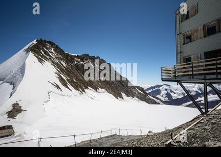 Buildings at the Mönchsjoch Hut under the Mönch mountain in the Bernese ...