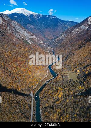 Aerial view of a Caucasus valley in Georgia shows villages, conifer ...