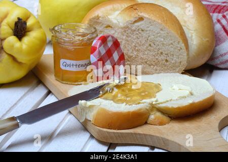 Slice of butter plait with quince jelly, quince jelly, Cydonia oblonga ...
