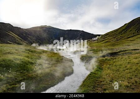 Hot spring flowing through valley Stock Photo - Alamy