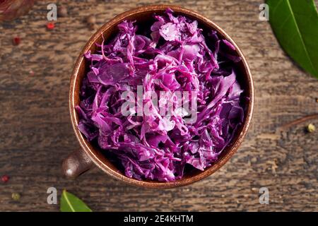 Fermented purple cabbage in a pot, with copy space Stock Photo - Alamy