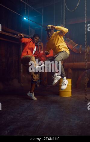 Two stylish rappers, breakdancing in studio Stock Photo - Alamy