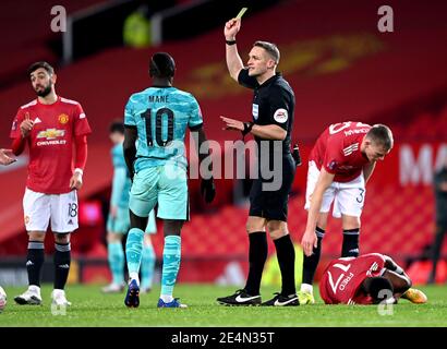 Referee Craig Pawson shows Liverpool's Amara Nallo a red card during ...