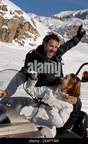 French actor Jose Garcia and his wife Isabelle Doval skiing during the ...