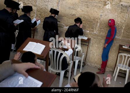 An Israeli dressed as Spiderman during the celebration the festival of ...