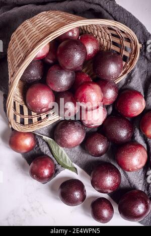 Close-up view of spilled fresh coffee beans on wooden table background ...