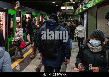 Milan, Italy. 25th Jan, 2021. Milan, Orange Zone, People on the subway ...
