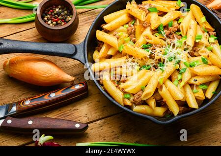 Skillet of pasta with fried minced meat Stock Photo - Alamy