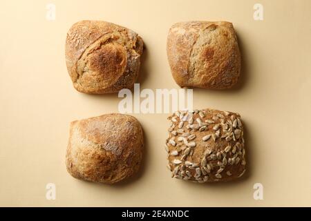 Fresh baked buns on beige background, top view Stock Photo - Alamy