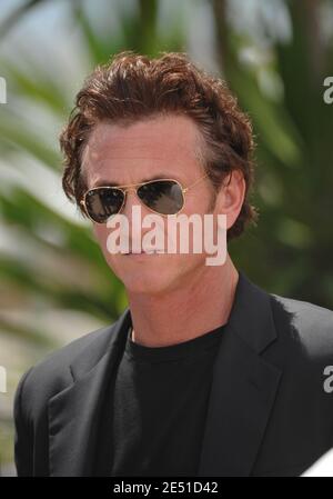 Sean Penn and president of the Cannes Film Festival Gilles Jacob walk ...
