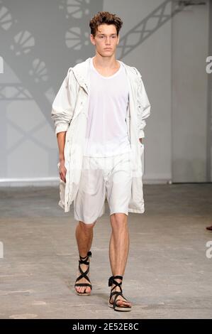 A model presents a creation by designers Paul Helbers and Marc Jacobs ...