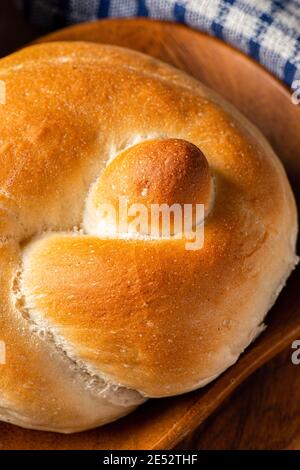Delicious fresh baked knot bread roll Stock Photo - Alamy