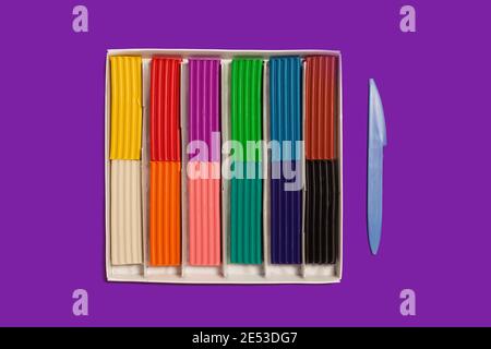 colorful plasticine sticks with a plastic knife Stock Photo - Alamy