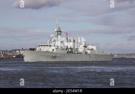 The Halifax-class frigate HMCS Toronto passes under the Angus L ...