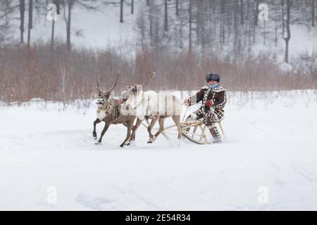 Iengra, Neryungri District, Yakutia, Russia. March 5, 2016 Evenk family ...