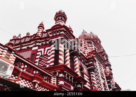 Red Masjid Mosque decorative brickwork of Jami ul Alfar Mosque minarets ...