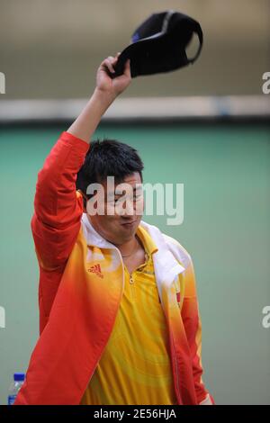 China's Wei Pang celebrates after winning the gold medal in the Beijing ...